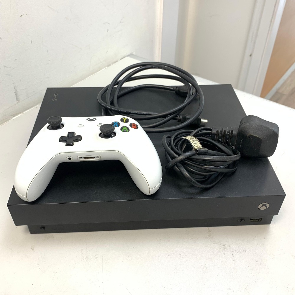 Used Xbox one x with Controller - Own4Less
